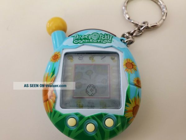 RARE Tamagotchi Connection V4 English Blue Yellow Sunflower Shell 2004 ...
