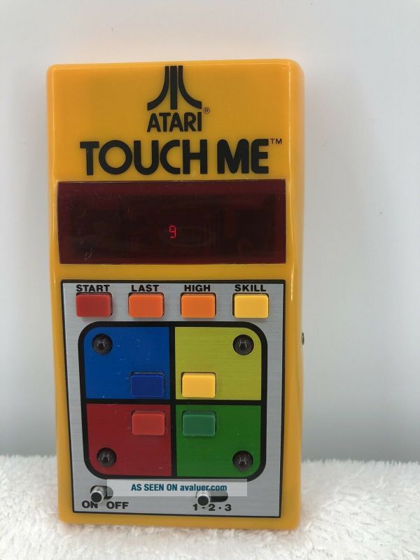 ATARI Touch Me Handheld Electronic Video Game Memory Lights Sounds ...