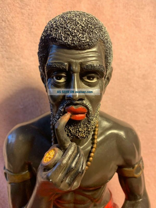 VINTAGE BLACK MAN SMOKING A PIPE STATUE, | #47391709